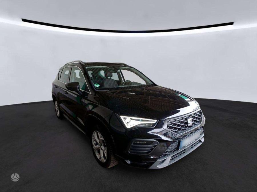 Black SEAT Ateca 2023 in Vilnius, with an engine capacity of 1.50 L and mileage of 100 thousand km for 21660 €, photo 4 on AUTOMOTO.COM.LV