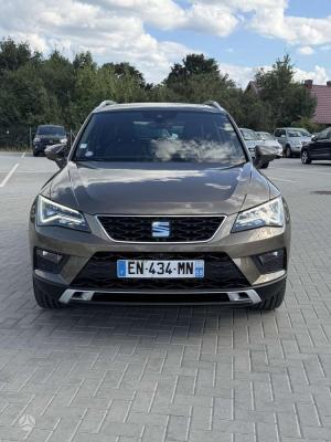 Brown SEAT Ateca 2017 in Taurage, with an engine capacity of 1.40 L and mileage of 166 thousand km for 12900 €, photo 4 on AUTOMOTO.COM.LV