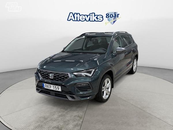 Green SEAT Ateca 2021 in Kaunas, with an engine capacity of 0.00 L and mileage of 63 thousand km for 27333 €, photo 7 on AUTOMOTO.COM.LV