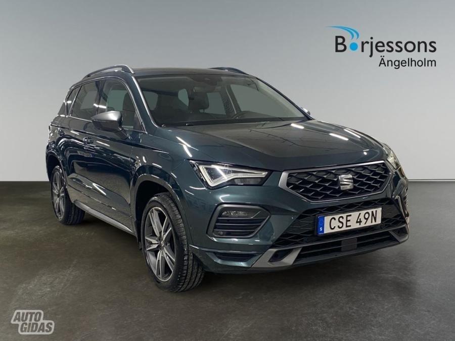 Green SEAT Ateca 2023 in Kaunas, with an engine capacity of 0.00 L and mileage of 76 thousand km for 27055 €, photo 1 on AUTOMOTO.COM.LV