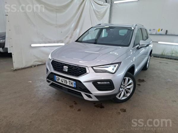 Grey SEAT Ateca 2023 in Riga, with an engine capacity of 2.00 L and mileage of 105 thousand km for 22200 €, photo 1 on AUTOMOTO.COM.LV