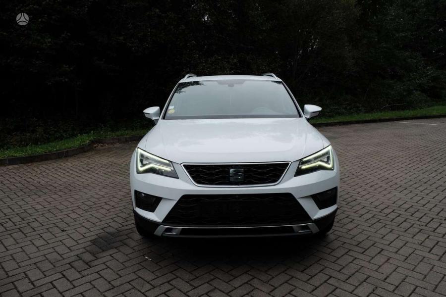 White SEAT Ateca 2016 in Taurage, with an engine capacity of 1.97 L and mileage of 298 thousand km for 10900 €, photo 1 on AUTOMOTO.COM.LV