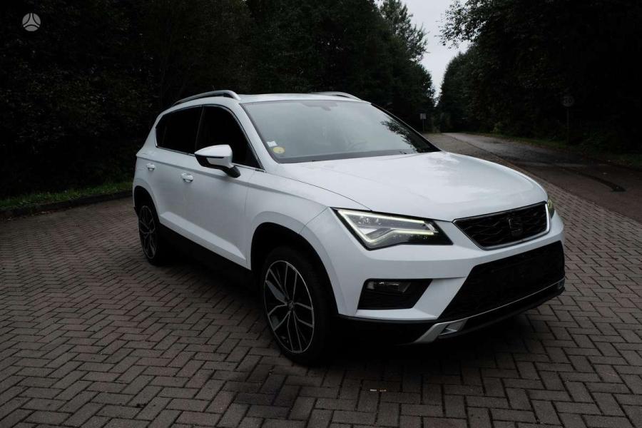 White SEAT Ateca 2016 in Taurage, with an engine capacity of 1.97 L and mileage of 298 thousand km for 10900 €, photo 3 on AUTOMOTO.COM.LV