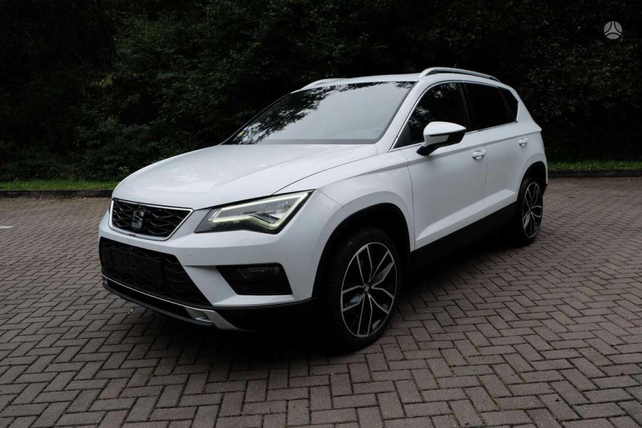 White SEAT Ateca 2016 in Taurage, with an engine capacity of 1.97 L and mileage of 298 thousand km for 10900 €, photo 4 on AUTOMOTO.COM.LV