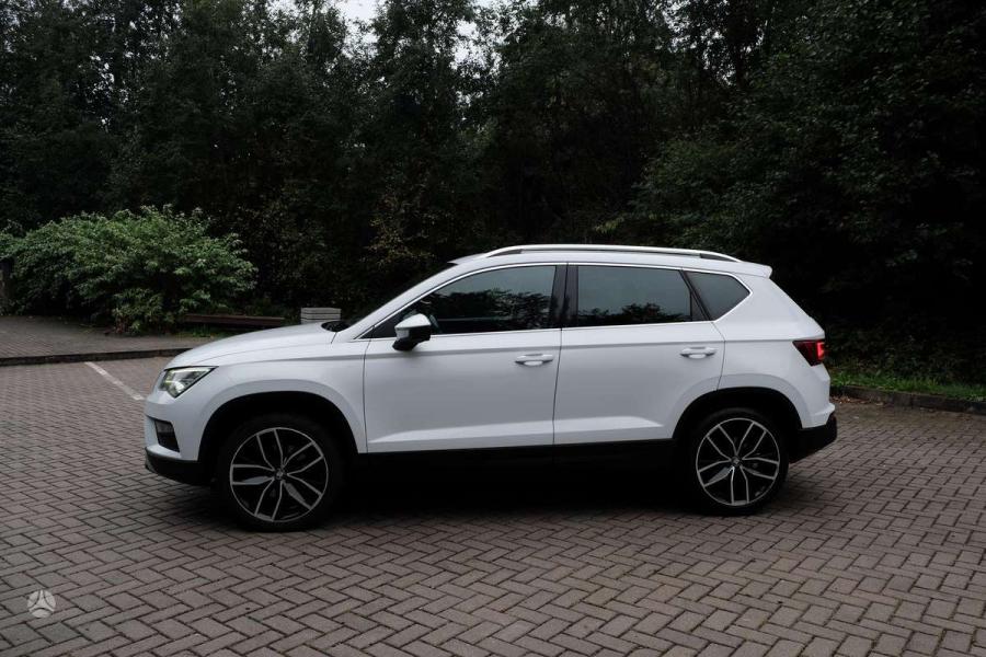 White SEAT Ateca 2016 in Taurage, with an engine capacity of 1.97 L and mileage of 298 thousand km for 10900 €, photo 5 on AUTOMOTO.COM.LV
