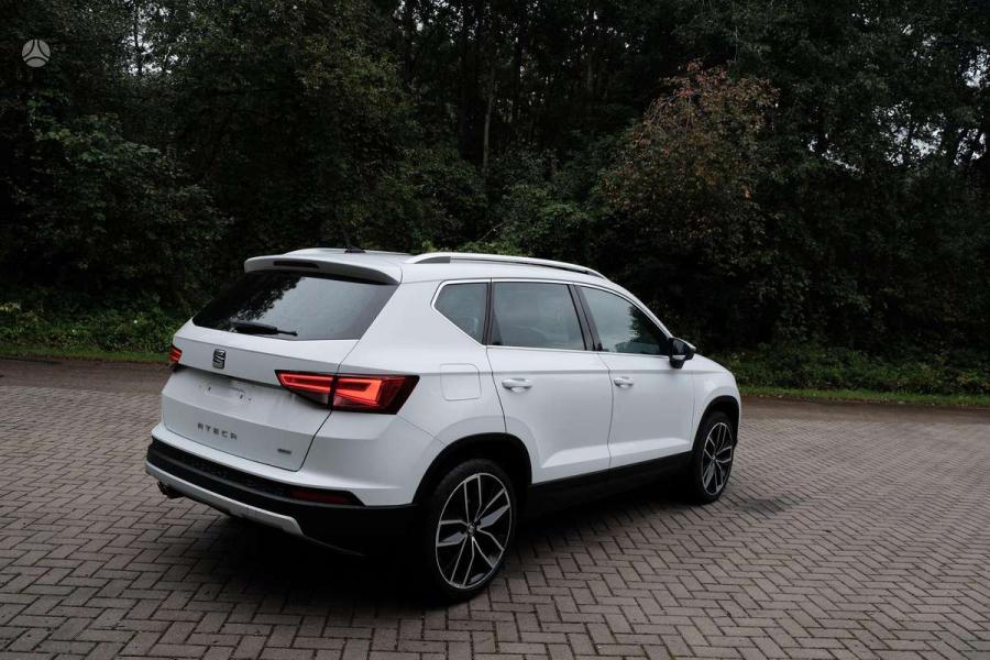 White SEAT Ateca 2016 in Taurage, with an engine capacity of 1.97 L and mileage of 298 thousand km for 10900 €, photo 7 on AUTOMOTO.COM.LV