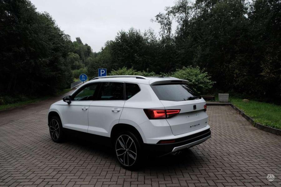 White SEAT Ateca 2016 in Taurage, with an engine capacity of 1.97 L and mileage of 298 thousand km for 10900 €, photo 8 on AUTOMOTO.COM.LV