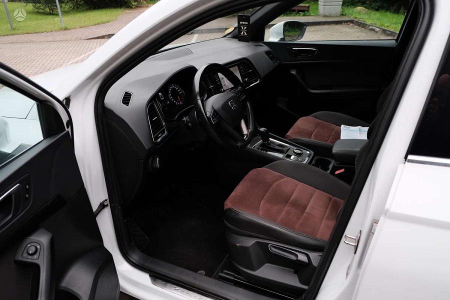 White SEAT Ateca 2016 in Taurage, with an engine capacity of 1.97 L and mileage of 298 thousand km for 10900 €, photo 14 on AUTOMOTO.COM.LV