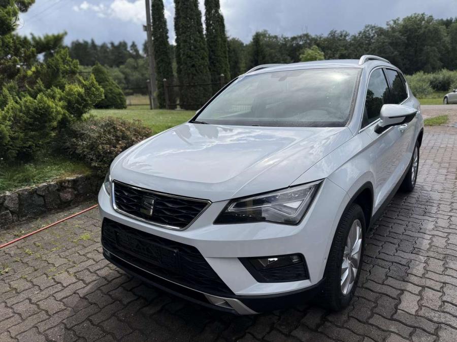 White SEAT Ateca 2017 in Utena, with an engine capacity of 1.60 L and mileage of 200 thousand km for 9950 €, photo 1 on AUTOMOTO.COM.LV