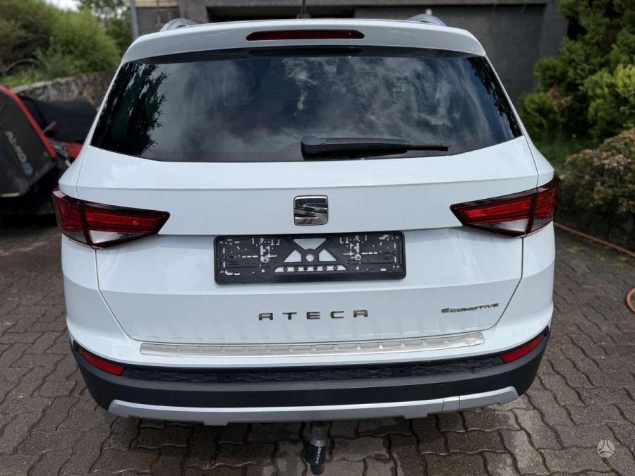 White SEAT Ateca 2017 in Utena, with an engine capacity of 1.60 L and mileage of 200 thousand km for 9950 €, photo 6 on AUTOMOTO.COM.LV