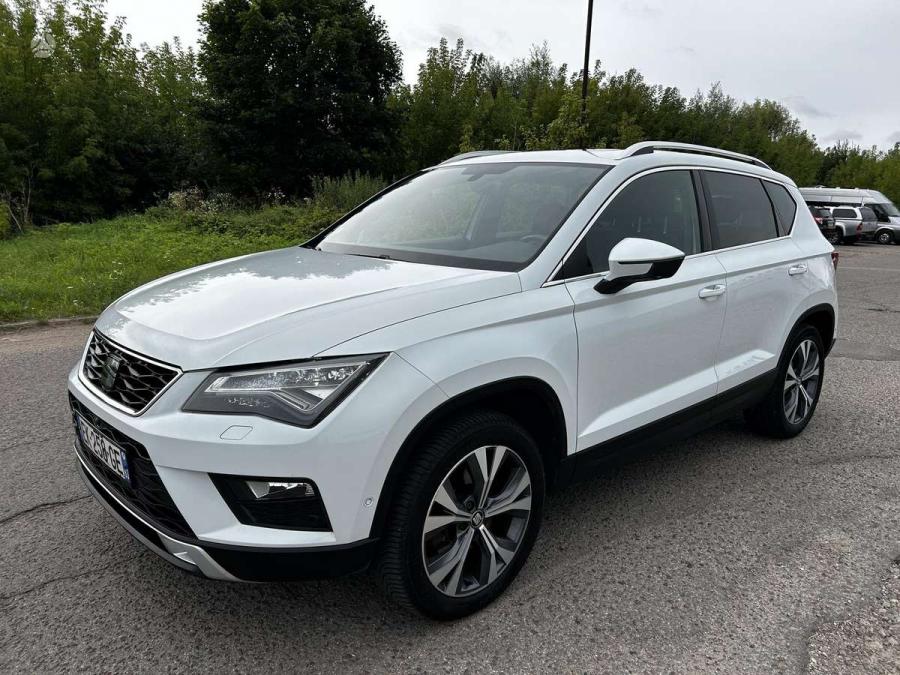 White SEAT Ateca 2017 in Panevezys, with an engine capacity of 1.97 L and mileage of 284 thousand km for 11900 €, photo 4 on AUTOMOTO.COM.LV