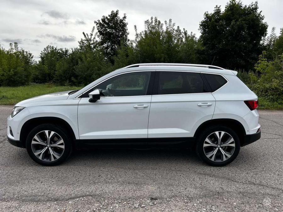 White SEAT Ateca 2017 in Panevezys, with an engine capacity of 1.97 L and mileage of 284 thousand km for 11900 €, photo 5 on AUTOMOTO.COM.LV