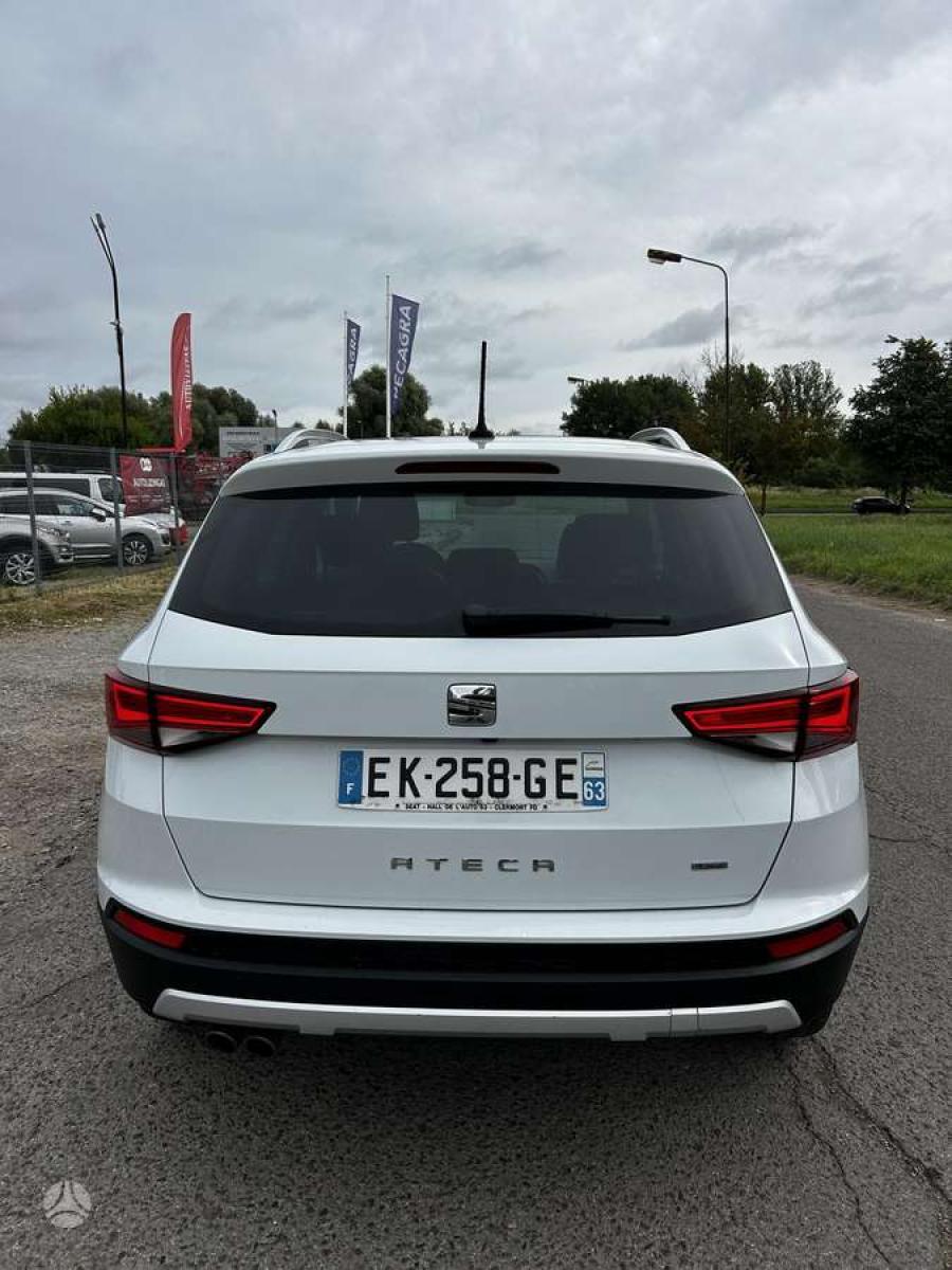 White SEAT Ateca 2017 in Panevezys, with an engine capacity of 1.97 L and mileage of 284 thousand km for 11900 €, photo 7 on AUTOMOTO.COM.LV