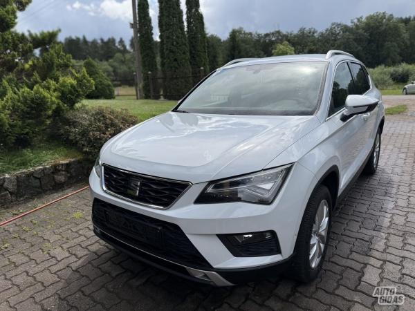 White SEAT Ateca 2017 in Utena, with an engine capacity of 1.60 L and mileage of 200 thousand km for 9700 €, photo 1 on AUTOMOTO.COM.LV