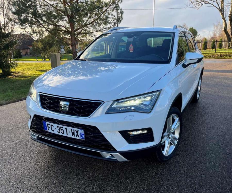 White SEAT Ateca 2018 in Taurage, with an engine capacity of 1.60 L and mileage of 105 thousand km for 13400 €, photo 1 on AUTOMOTO.COM.LV