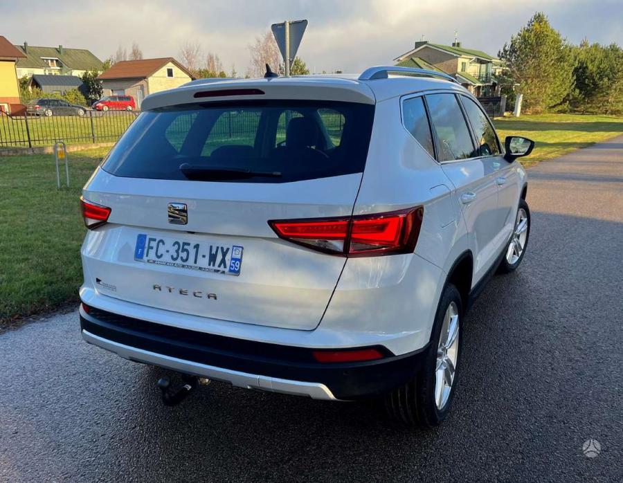 White SEAT Ateca 2018 in Taurage, with an engine capacity of 1.60 L and mileage of 105 thousand km for 13400 €, photo 4 on AUTOMOTO.COM.LV