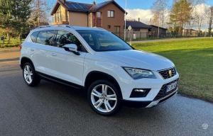 White SEAT Ateca 2018 in Taurage, with an engine capacity of 1.60 L and mileage of 105 thousand km for 13400 €, photo 5 on AUTOMOTO.COM.LV
