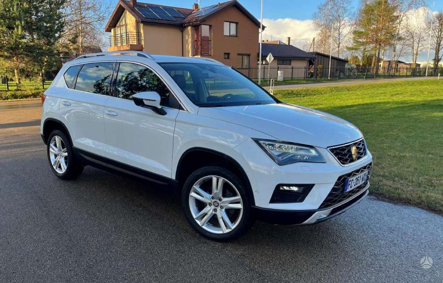White SEAT Ateca 2018 in Taurage, with an engine capacity of 1.60 L and mileage of 105 thousand km for 13400 €, photo 5 on AUTOMOTO.COM.LV