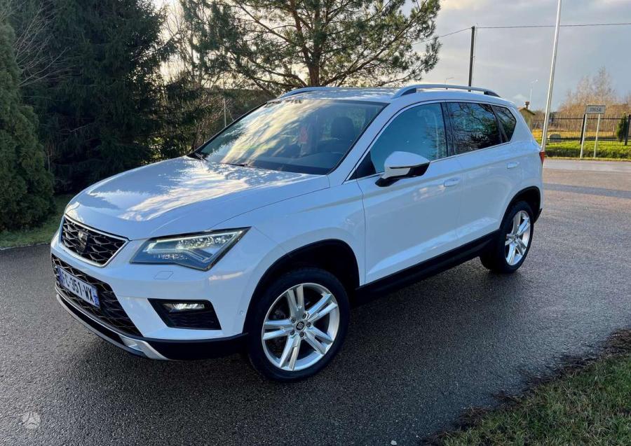 White SEAT Ateca 2018 in Taurage, with an engine capacity of 1.60 L and mileage of 105 thousand km for 13400 €, photo 6 on AUTOMOTO.COM.LV