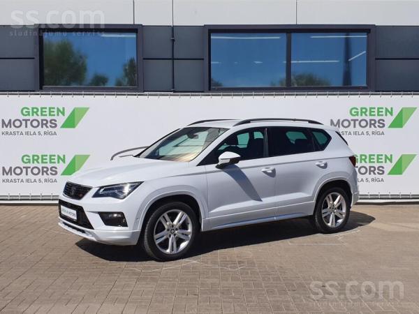 White SEAT Ateca 2018 in Riga, with an engine capacity of 2.00 L and mileage of 208 thousand km for 14900 €, photo 1 on AUTOMOTO.COM.LV