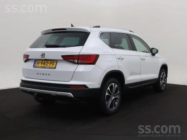 White SEAT Ateca 2018 in Riga, with an engine capacity of 1.60 L and mileage of 119 thousand km for 14990 €, photo 2 on AUTOMOTO.COM.LV