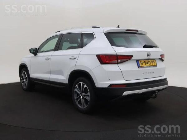 White SEAT Ateca 2018 in Riga, with an engine capacity of 1.60 L and mileage of 119 thousand km for 14990 €, photo 4 on AUTOMOTO.COM.LV