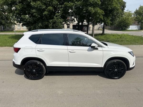 White SEAT Ateca 2019 in Telschi, with an engine capacity of 1.97 L and mileage of 198 thousand km for 13900 €, photo 4 on AUTOMOTO.COM.LV