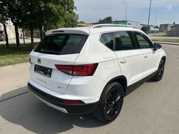 White SEAT Ateca 2019 in Telschi, with an engine capacity of 1.97 L and mileage of 198 thousand km for 13900 €, photo 5 on AUTOMOTO.COM.LV