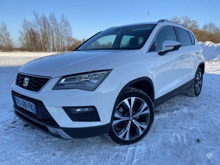 White SEAT Ateca 2020 in Taurage, with an engine capacity of 1.97 L and mileage of 188 thousand km for 13900 €, photo 1 on AUTOMOTO.COM.LV