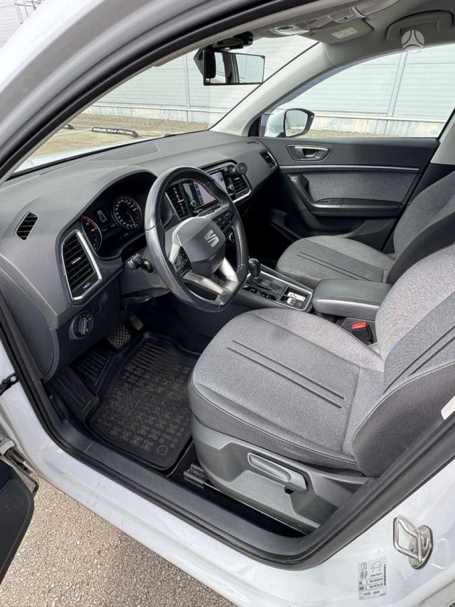 White SEAT Ateca 2022 in Siauliai, with an engine capacity of 1.50 L and mileage of 125 thousand km for 19999 €, photo 8 on AUTOMOTO.COM.LV
