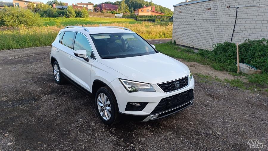 White SEAT Ateca 2019 in Alytus, with an engine capacity of 1.00 L and mileage of 154 thousand km for 10999 €, photo 1 on AUTOMOTO.COM.LV