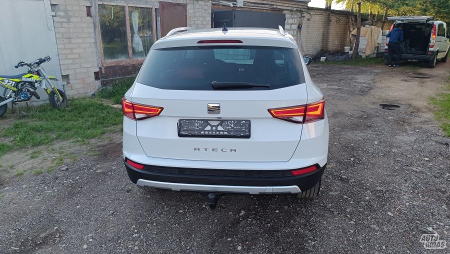 White SEAT Ateca 2019 in Alytus, with an engine capacity of 1.00 L and mileage of 154 thousand km for 10999 €, photo 6 on AUTOMOTO.COM.LV