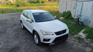 White SEAT Ateca 2019 in Alytus, with an engine capacity of 1.00 L and mileage of 154 thousand km for 10999 €, photo 9 on AUTOMOTO.COM.LV