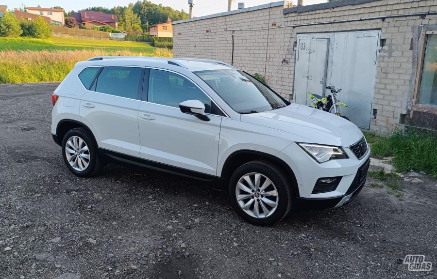 White SEAT Ateca 2019 in Alytus, with an engine capacity of 1.00 L and mileage of 154 thousand km for 10999 €, photo 12 on AUTOMOTO.COM.LV