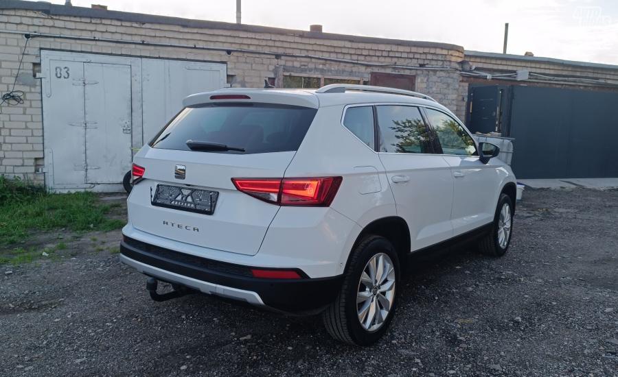 White SEAT Ateca 2019 in Alytus, with an engine capacity of 1.00 L and mileage of 154 thousand km for 10999 €, photo 13 on AUTOMOTO.COM.LV