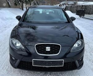 Black SEAT Leon 2009 in Vilnius, with an engine capacity of 1.40 L and mileage of 236 thousand km for 2990 €, photo 5 on AUTOMOTO.COM.LV