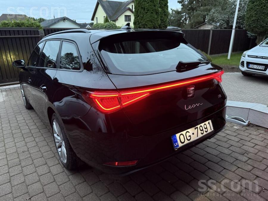 Black SEAT Leon 2022 in Ogre, with an engine capacity of 2.00 L and mileage of 276 thousand km for 12950 €, photo 6 on AUTOMOTO.COM.LV