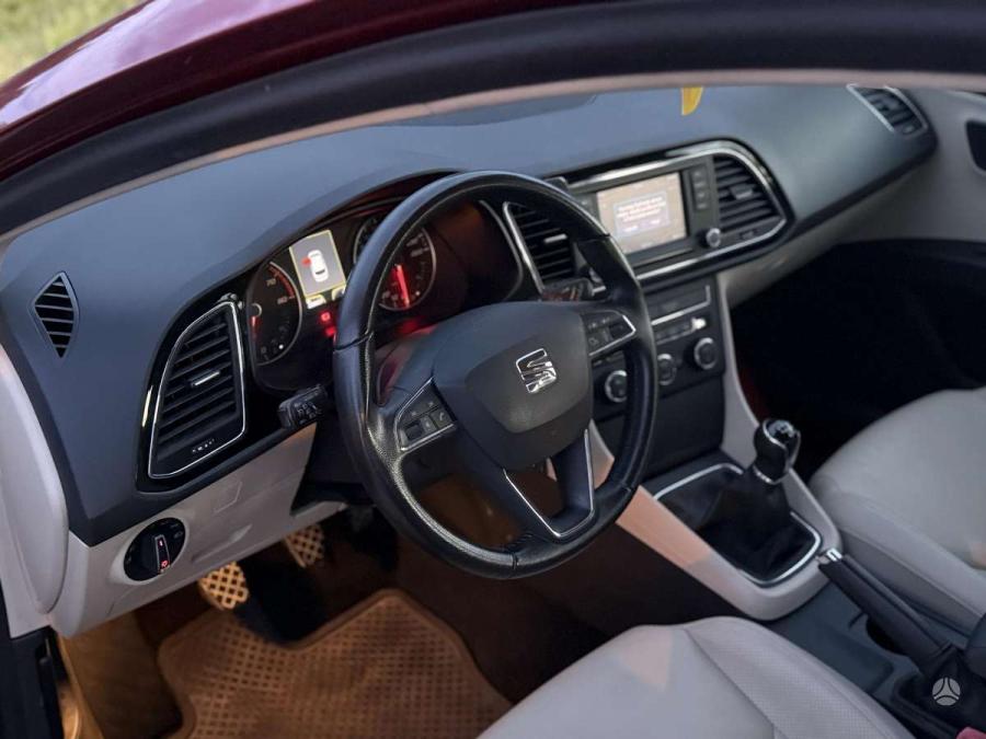 Red SEAT Leon 2014 in Utena, with an engine capacity of 1.40 L and mileage of 228 thousand km for 6900 €, photo 13 on AUTOMOTO.COM.LV