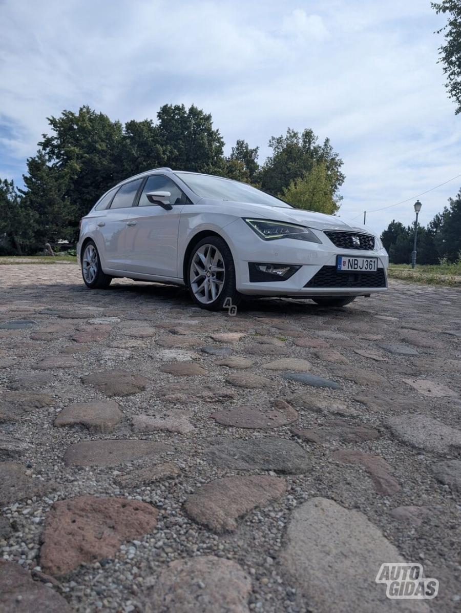 White SEAT Leon 2014 in Panevezys, with an engine capacity of 2.00 L and mileage of 276 thousand km for 7499 €, photo 4 on AUTOMOTO.COM.LV