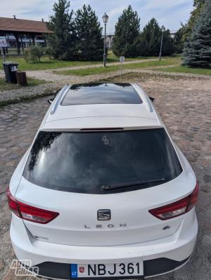White SEAT Leon 2014 in Panevezys, with an engine capacity of 2.00 L and mileage of 276 thousand km for 7499 €, photo 5 on AUTOMOTO.COM.LV