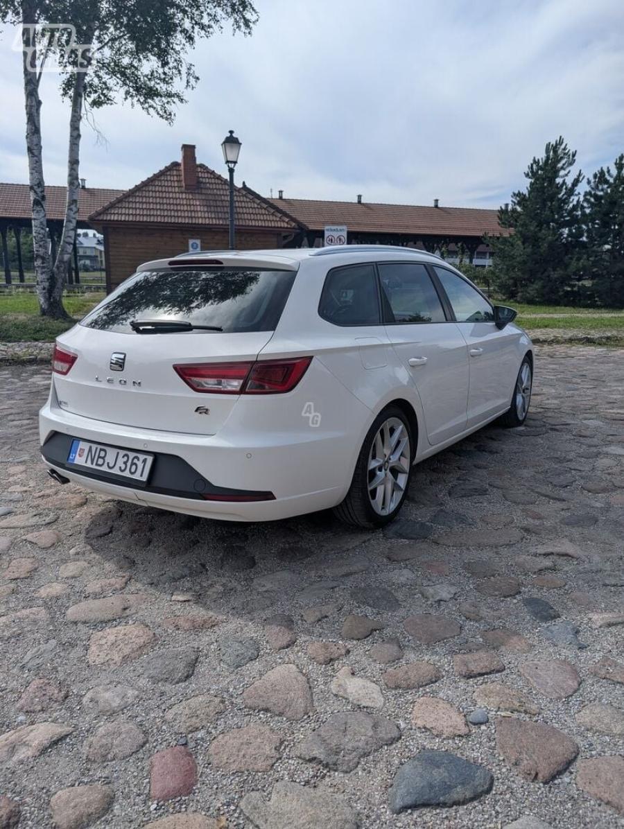 White SEAT Leon 2014 in Panevezys, with an engine capacity of 2.00 L and mileage of 276 thousand km for 7499 €, photo 6 on AUTOMOTO.COM.LV