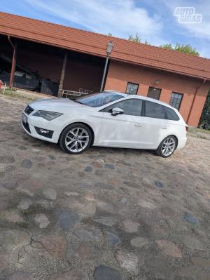White SEAT Leon 2014 in Panevezys, with an engine capacity of 2.00 L and mileage of 276 thousand km for 7499 €, photo 9 on AUTOMOTO.COM.LV