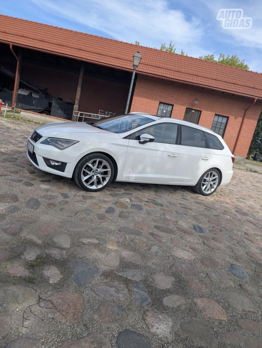 White SEAT Leon 2014 in Panevezys, with an engine capacity of 2.00 L and mileage of 276 thousand km for 7499 €, photo 9 on AUTOMOTO.COM.LV