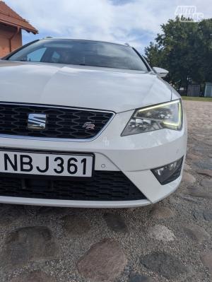 White SEAT Leon 2014 in Panevezys, with an engine capacity of 2.00 L and mileage of 276 thousand km for 7499 €, photo 10 on AUTOMOTO.COM.LV