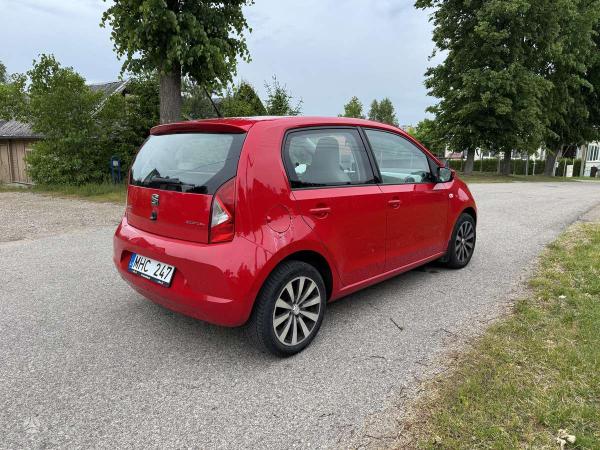 Red SEAT Mii 2014 in Utena, with an engine capacity of 1.00 L and mileage of 170 thousand km for 2500 €, photo 3 on AUTOMOTO.COM.LV