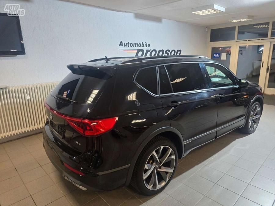 Black SEAT Tarraco 2021 in Kaunas, with an engine capacity of 2.00 L and mileage of 96 thousand km for 32679 €, photo 2 on AUTOMOTO.COM.LV