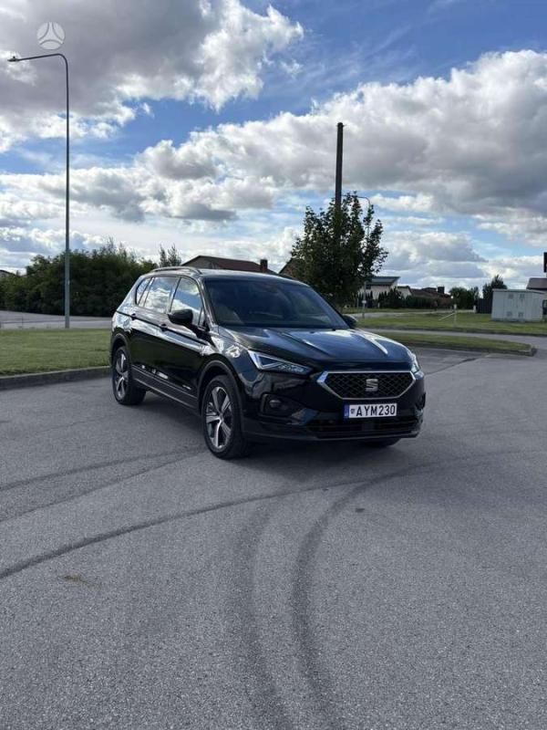 Black SEAT Tarraco 2021 in Panevezys, with an engine capacity of 1.97 L and mileage of 96 thousand km for 21500 €, photo 4 on AUTOMOTO.COM.LV
