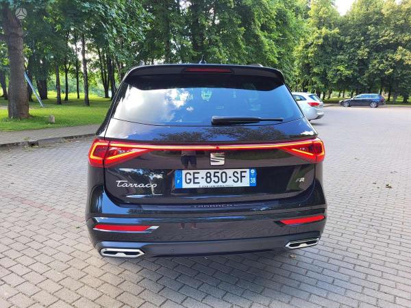 Black SEAT Tarraco 2022 in Taurage, with an engine capacity of 1.97 L and mileage of 274 thousand km for 17900 €, photo 5 on AUTOMOTO.COM.LV