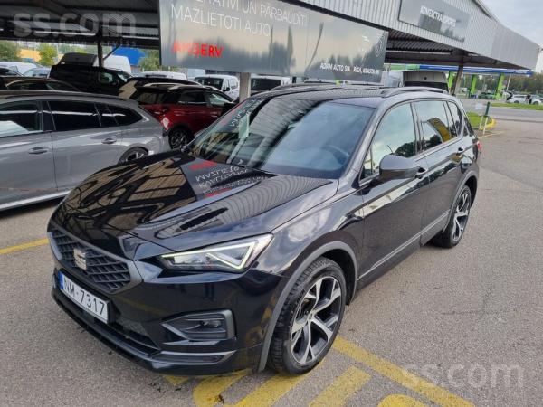 Black SEAT Tarraco 2023 in Riga, with an engine capacity of 2.00 L and mileage of 92 thousand km for 27200 €, photo 1 on AUTOMOTO.COM.LV