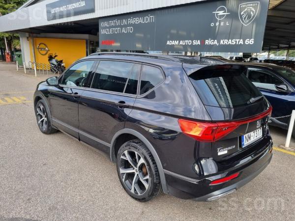 Black SEAT Tarraco 2023 in Riga, with an engine capacity of 2.00 L and mileage of 92 thousand km for 27200 €, photo 5 on AUTOMOTO.COM.LV